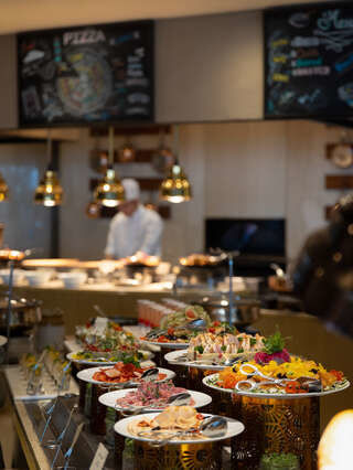 Menu of Cafe Knosh, The Leela Ambience Convention Hotel, New Delhi